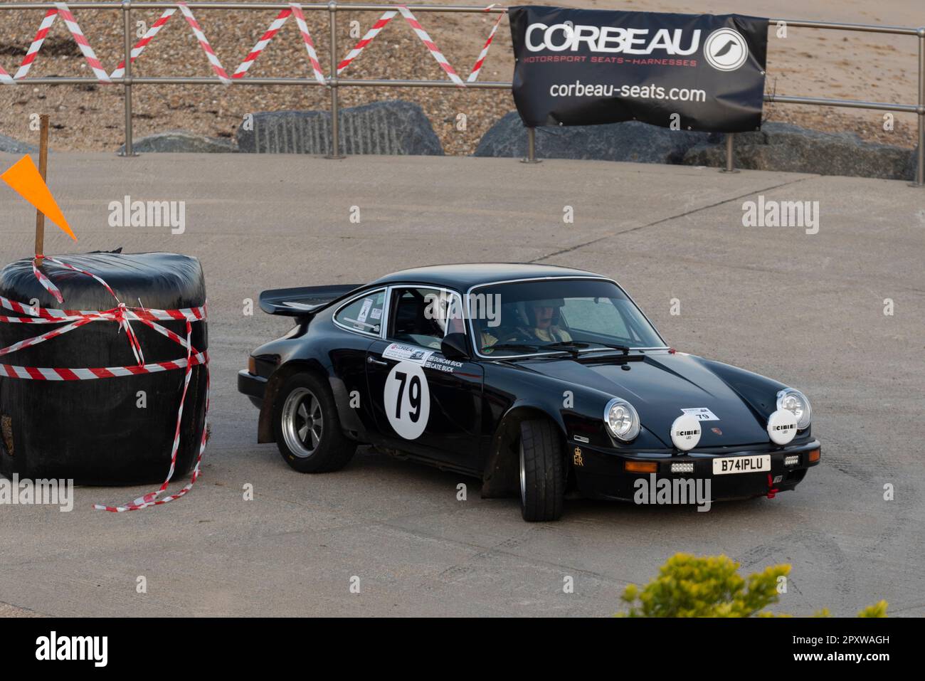 Duncan Buck racing a classic 1980s Porsche 911 competing in the Corbeau ...