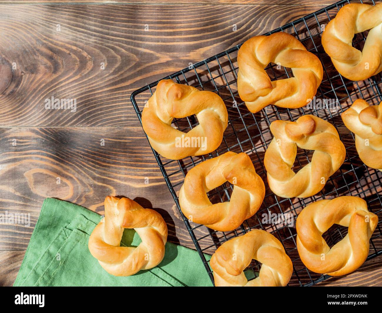 Taralli twist on wooden background. Typical italian ring-shaped or ...