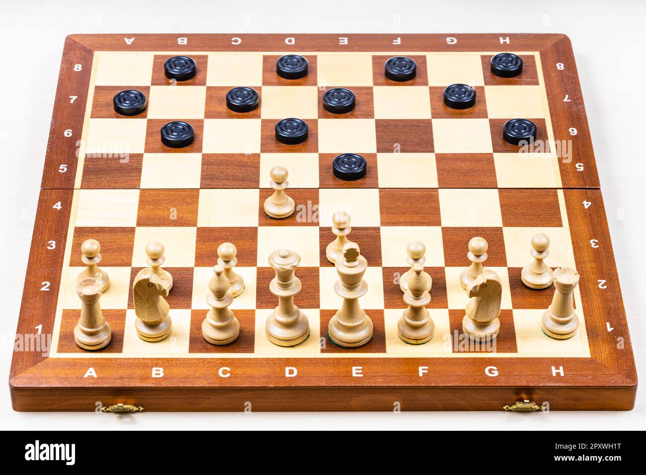 playing by different rules on the same board - black checkers and white ...