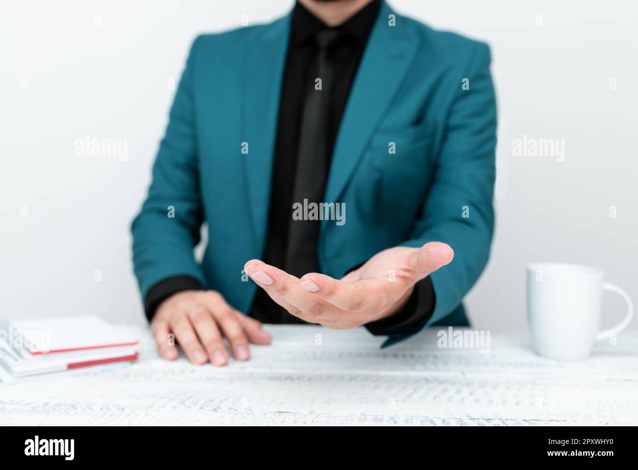 Businessman in jacket Holding Important Message In One Hand Stock Photo ...