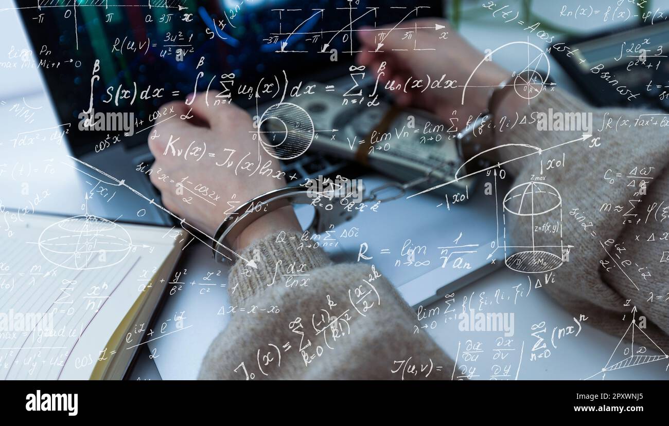 Quantitative analyst is drawing different math formulas on the glass ...