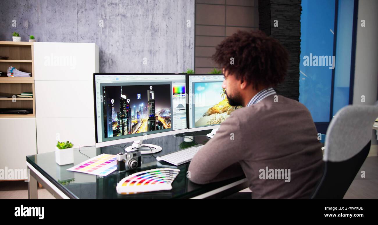 African Graphic Web Designer Using Design Editing Software Stock Photo ...