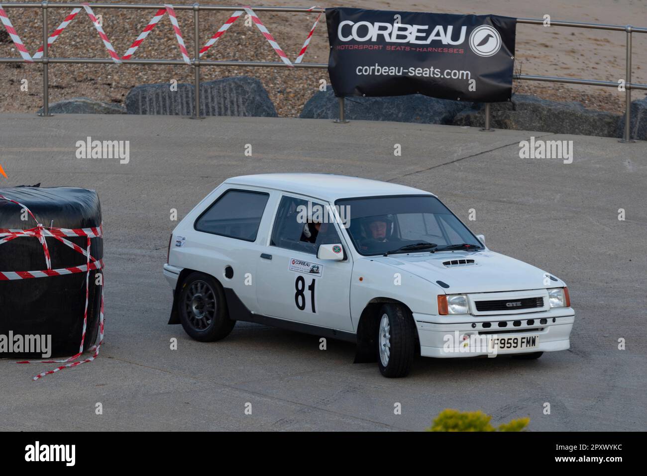 Neville Hudd racing an old 1988 Vauxhall Nova GTE competing in Corbeau ...