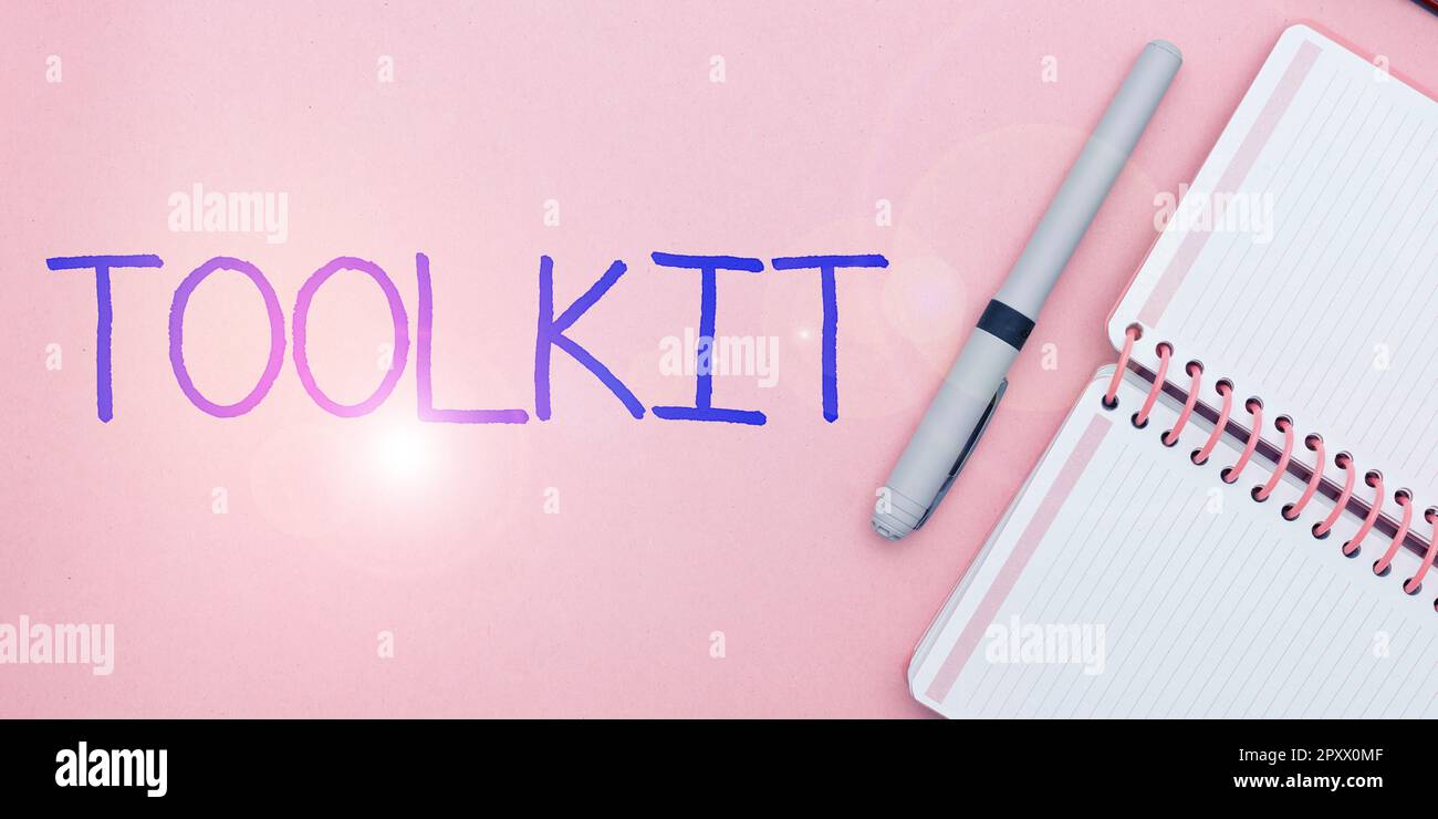 Hand writing sign Toolkit, Conceptual photo set of tools kept in a bag ...