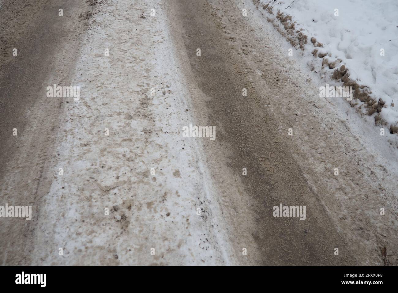 Snowdrifts on the side of the road. Bad weather and traffic. Snow on ...