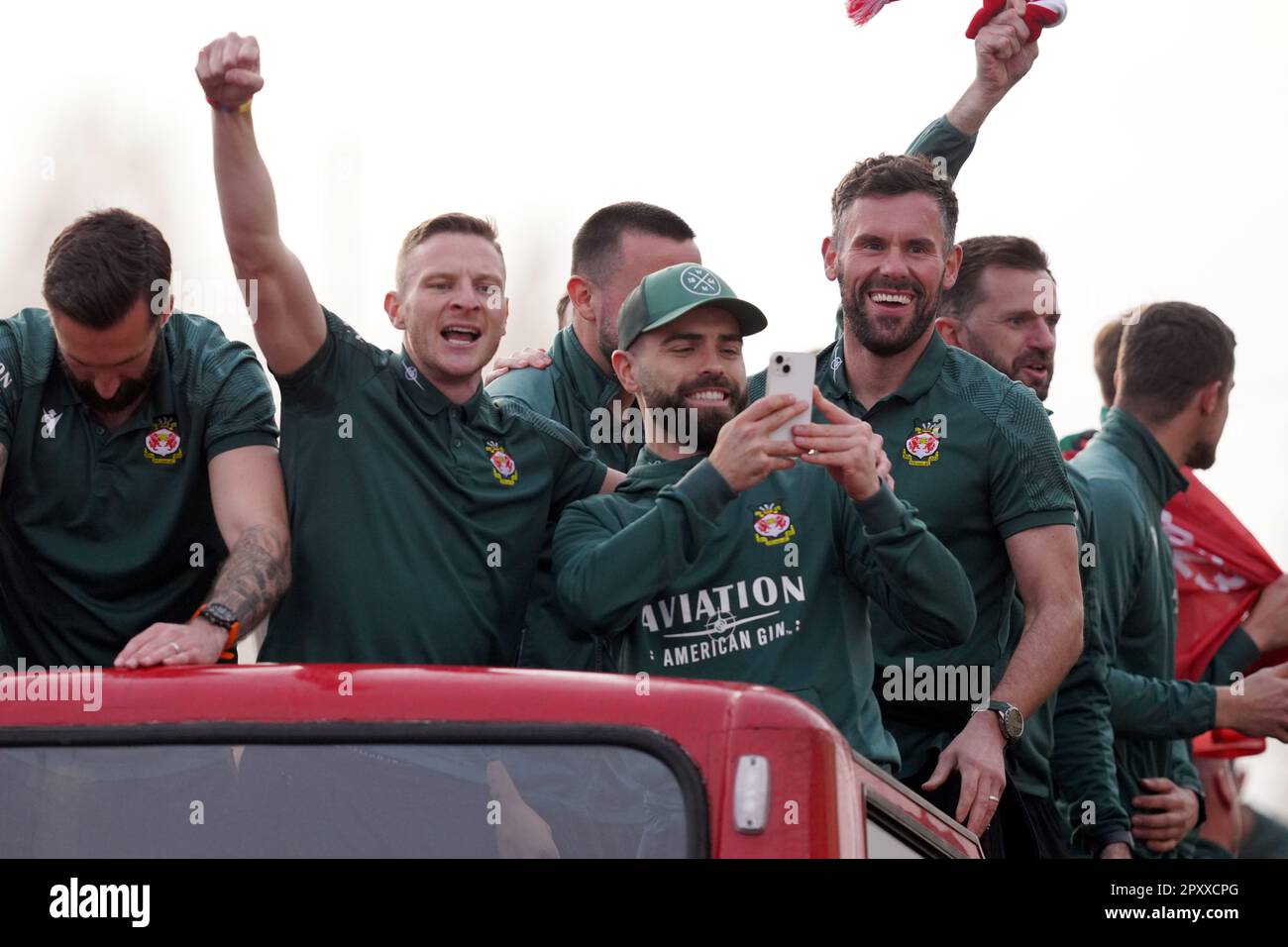 Wrexham’s Paul Mullin (left), Wrexham’s Elliot Lee (centre) and Wrexham ...
