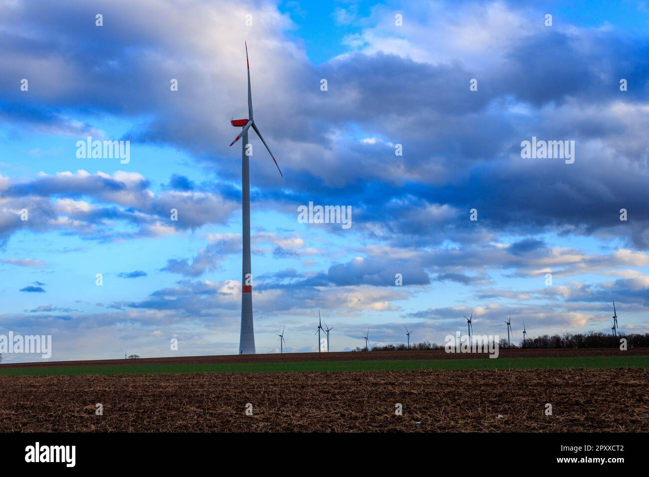 Wind Turbines in a Rural Landscape Under a Dramatic Cloudy Sky, Germany ...