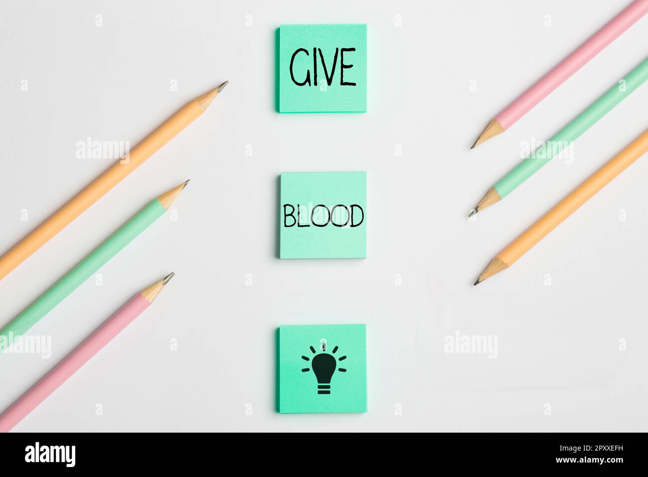 Text showing inspiration Give Blood, Word for person voluntarily has ...