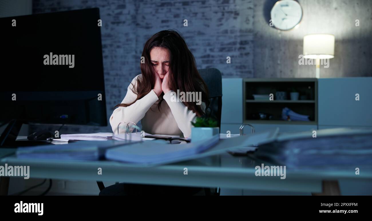 Stressed Tax Advisor With Headache. Sad Accountant Stock Photo - Alamy