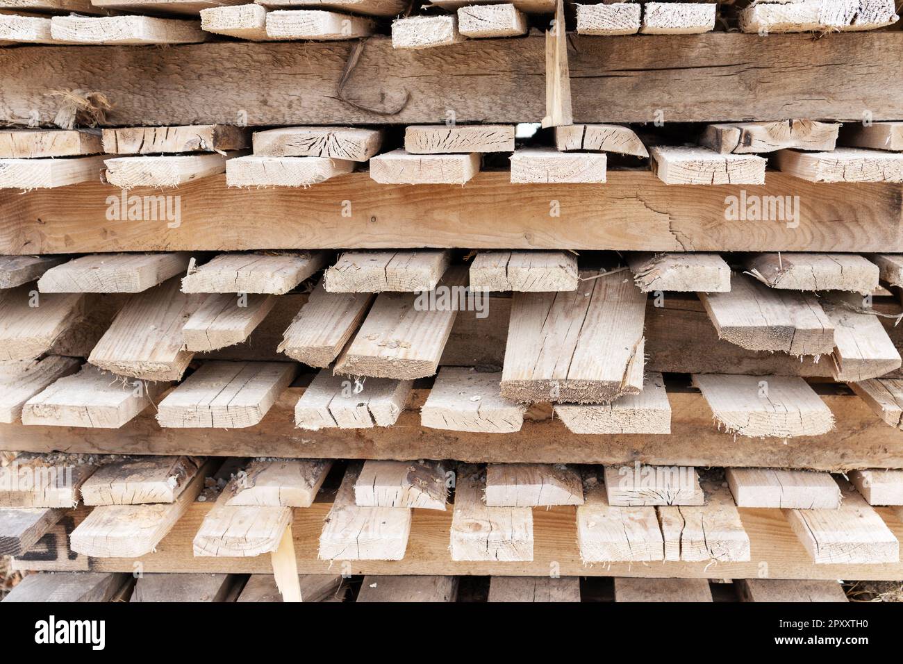 A stack of pallets are stacked on top of each other Stock Photo - Alamy