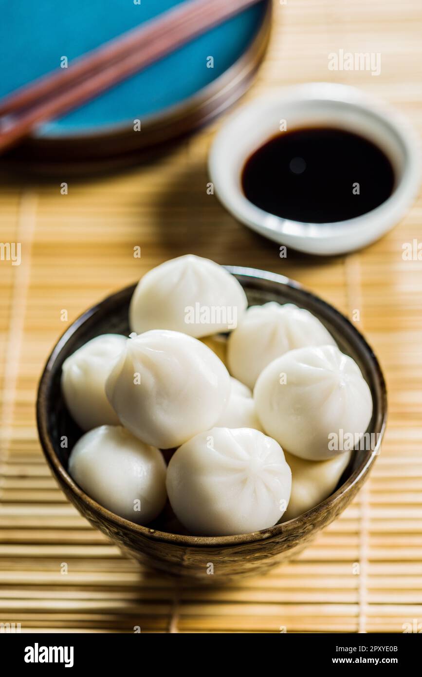 Xiaolongbao, traditional steamed dumplings and soy sauce. Xiao Long Bao ...