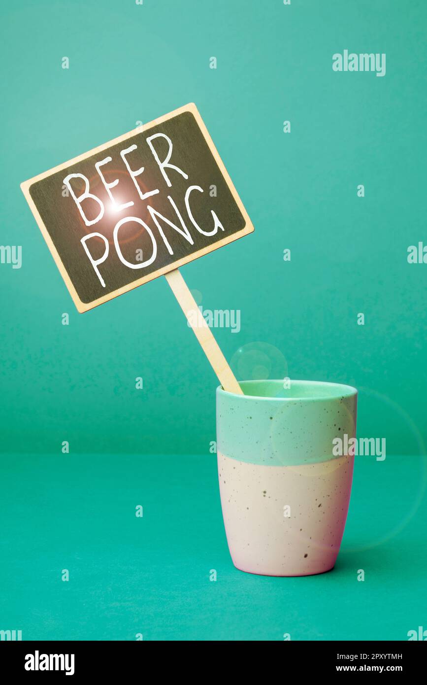 Text caption presenting Beer Pong, Word Written on a game with a set of ...