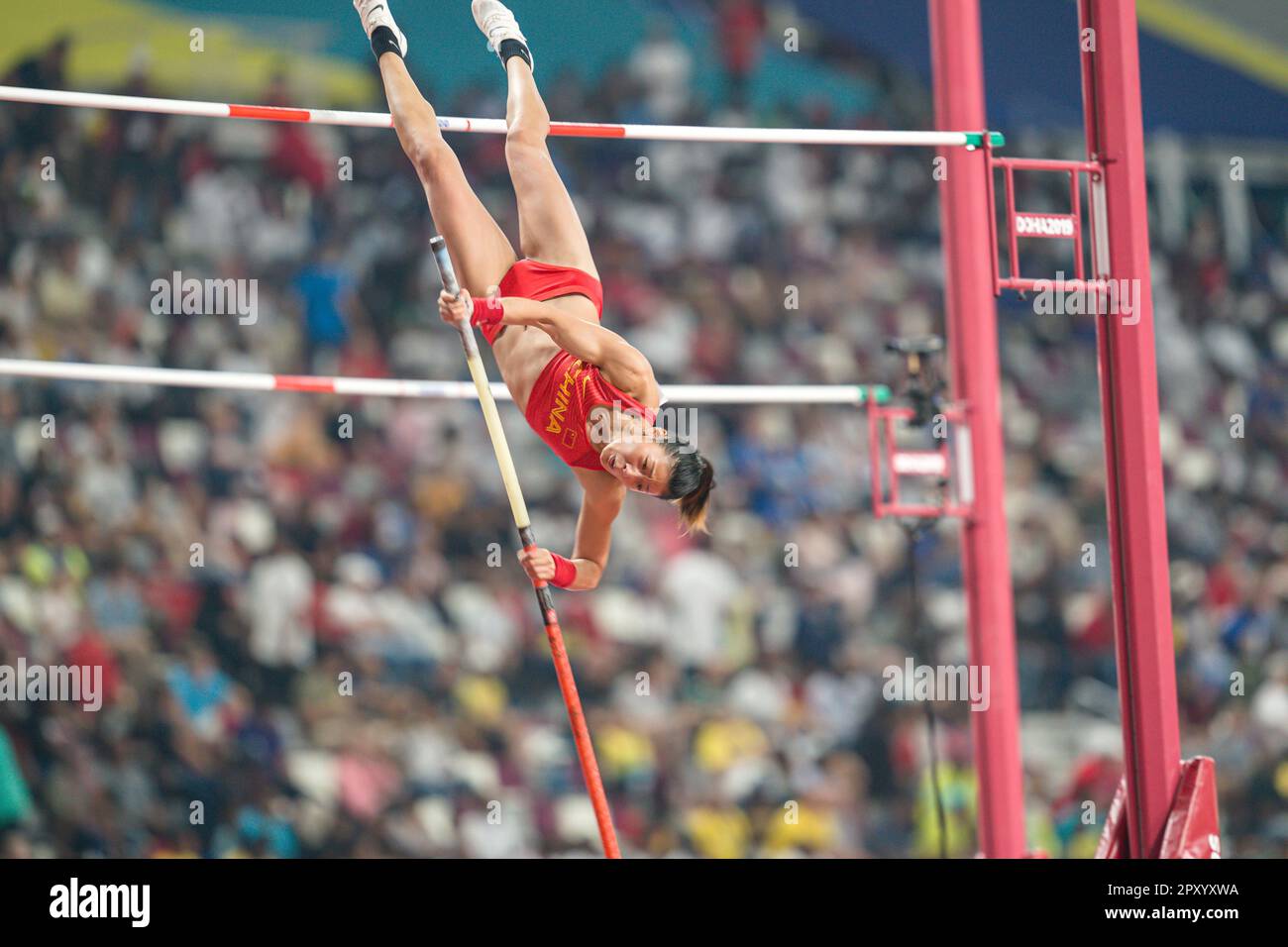 Li Ling participating in the pole vault at the Doha 2019 World ...