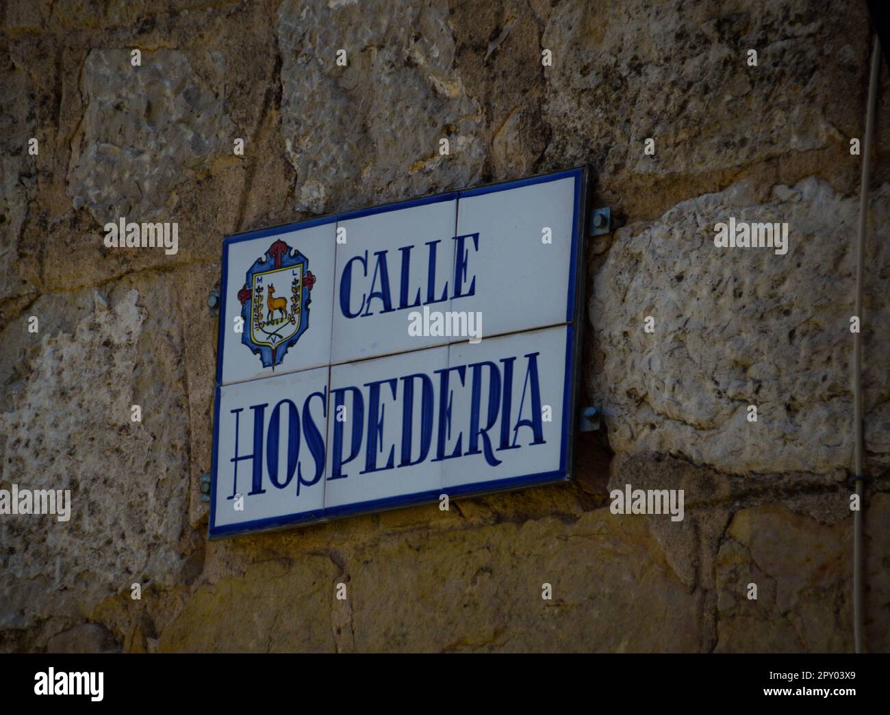 Identification plate with street name in a town in Castilla la Mancha ...