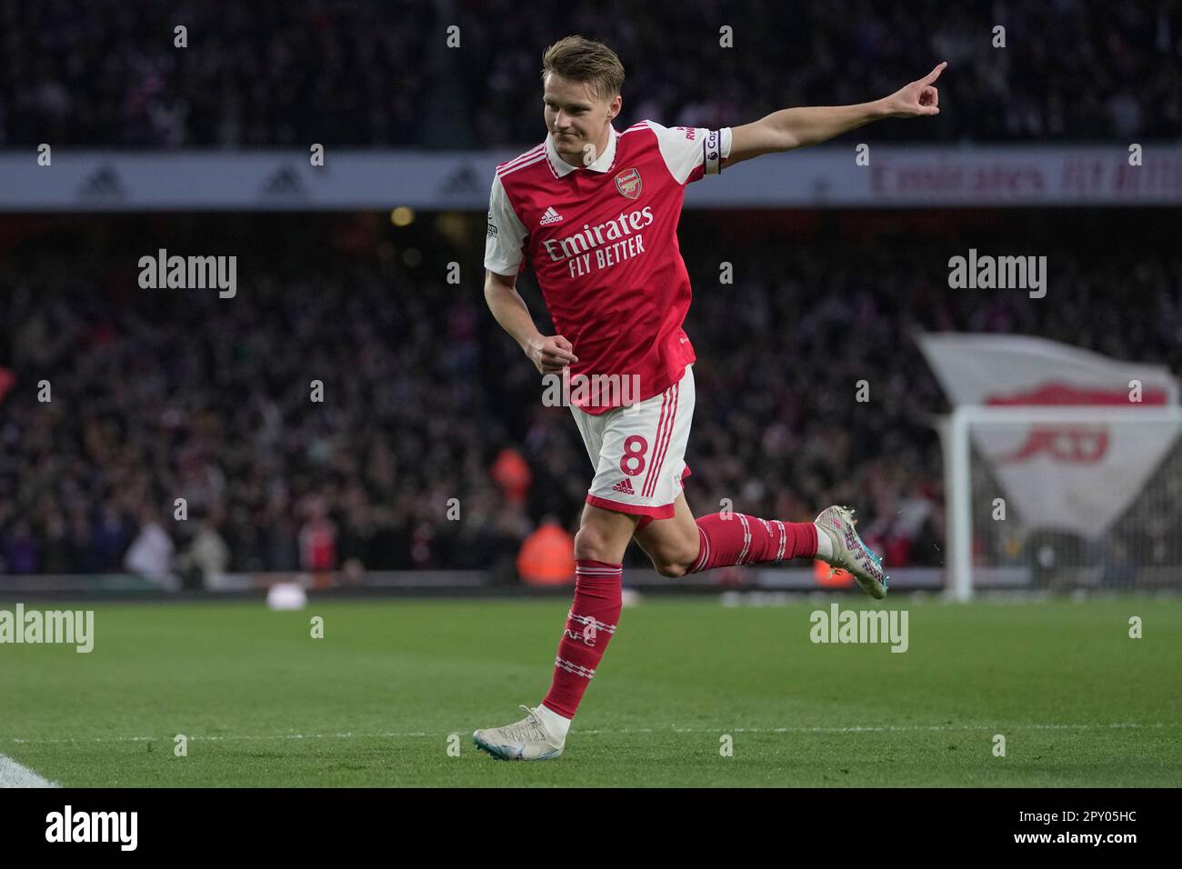 Arsenal's Martin Odegaard celebrates after scoring his side's opening ...