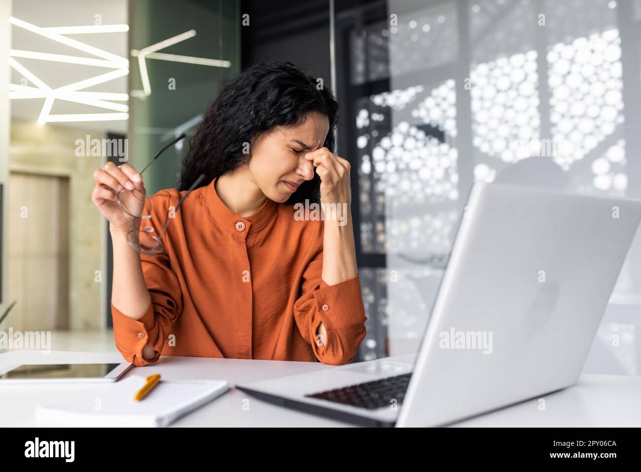 Angry tired office employee rubbing hi-res stock photography and images ...