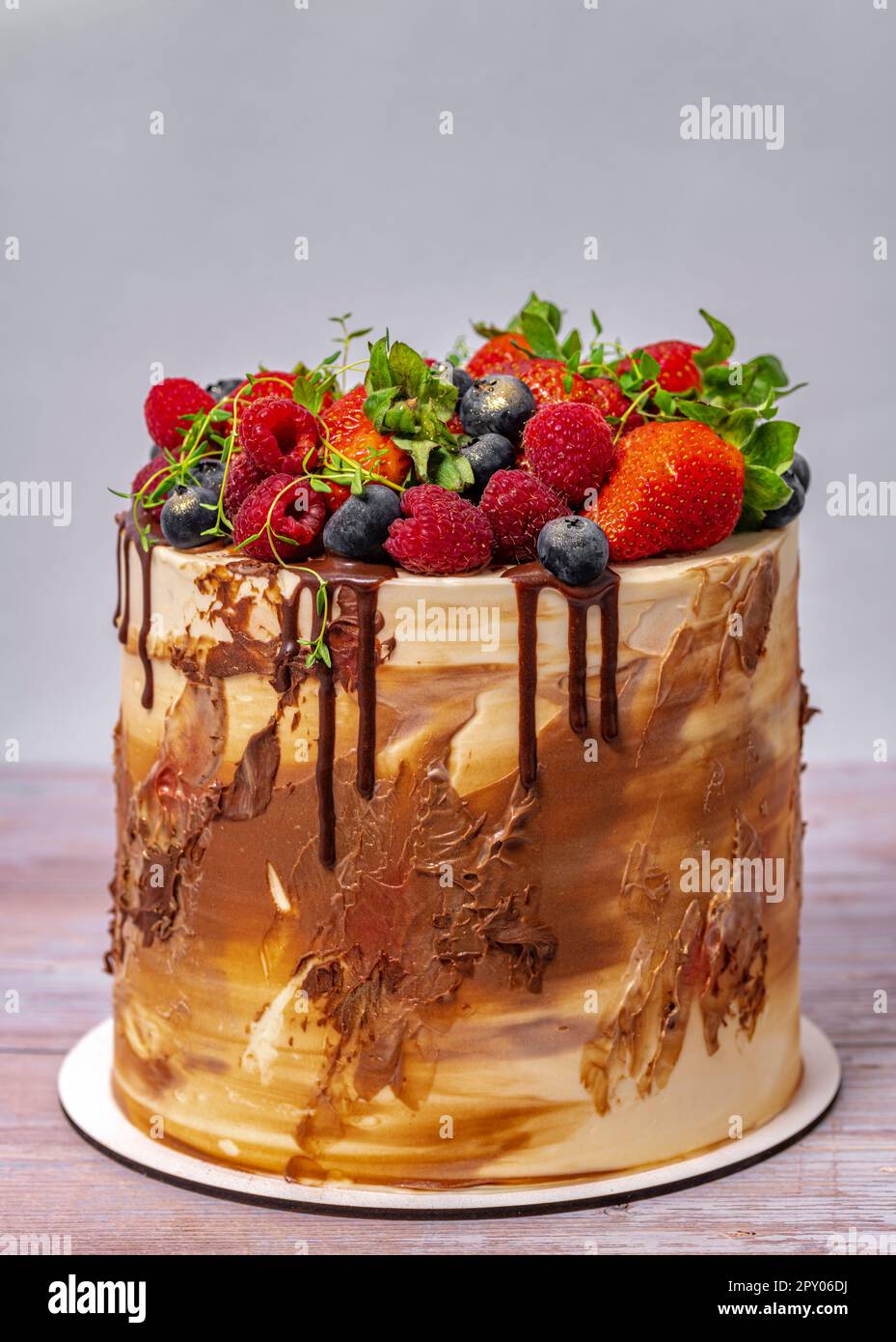Fresh fruit color beautiful cake with color background interior Stock ...