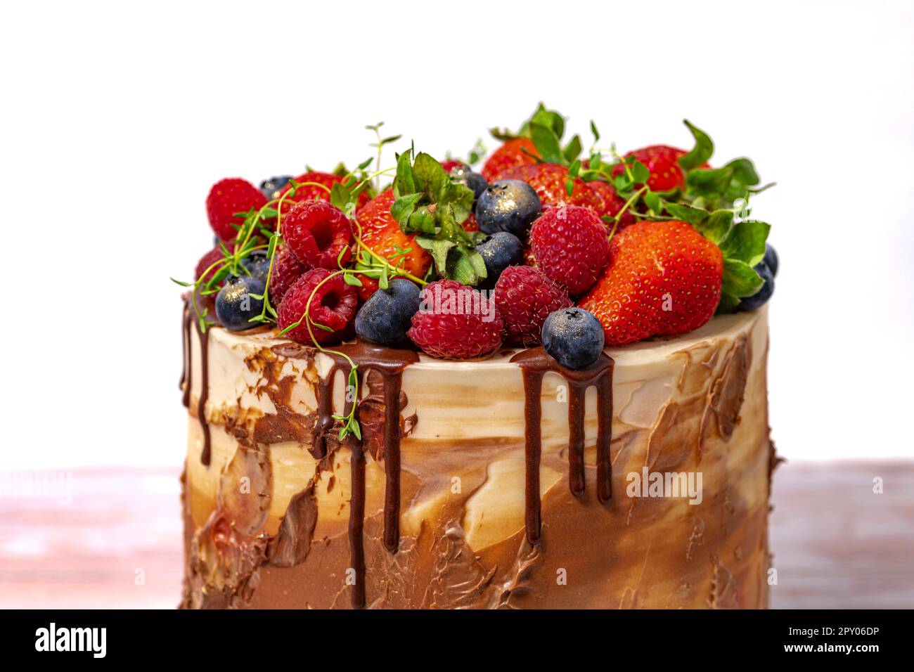 Fresh fruit color beautiful cake with color background interior Stock ...