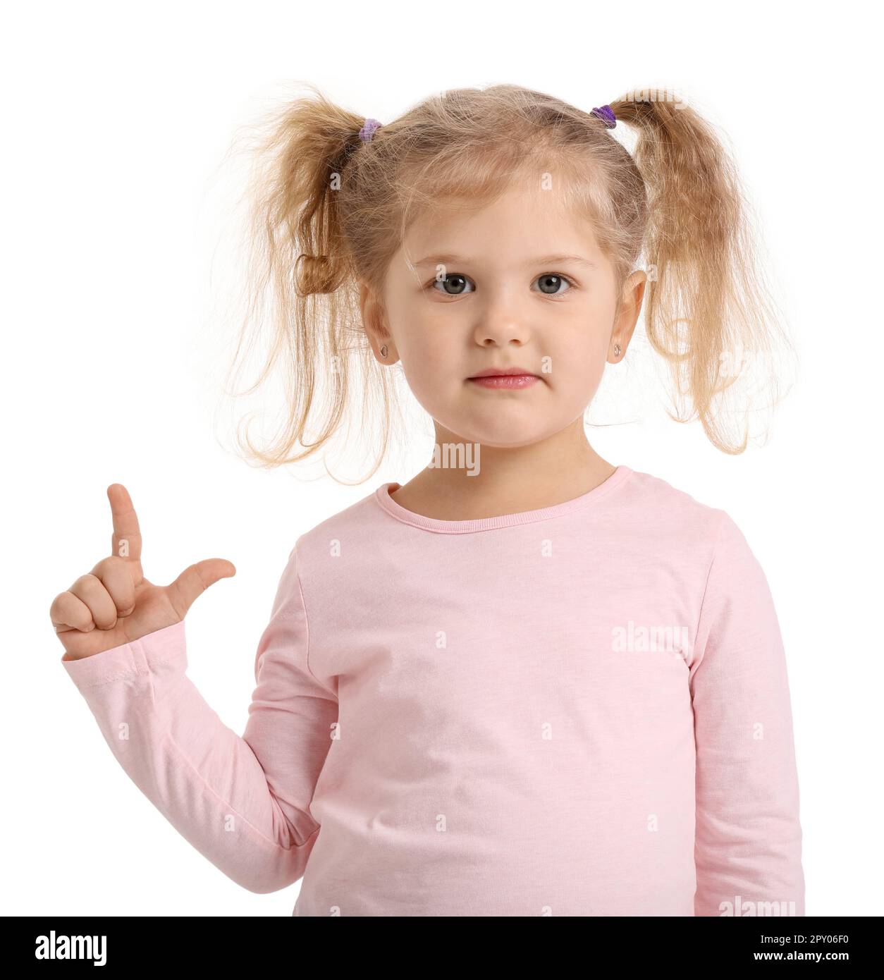 Funny little girl showing loser gesture on white background Stock Photo ...