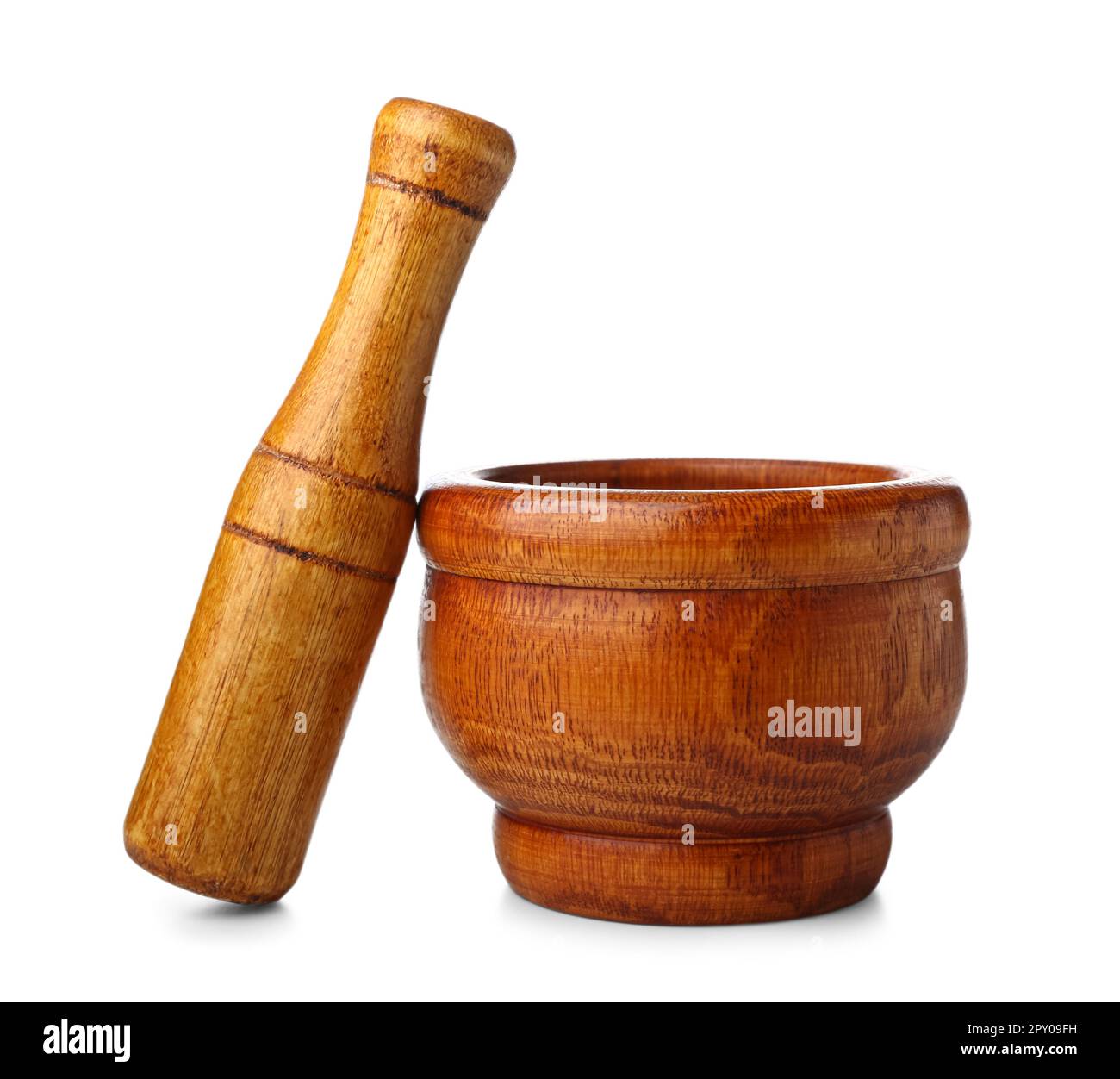 Wooden mortar and pestle isolated on white background Stock Photo - Alamy