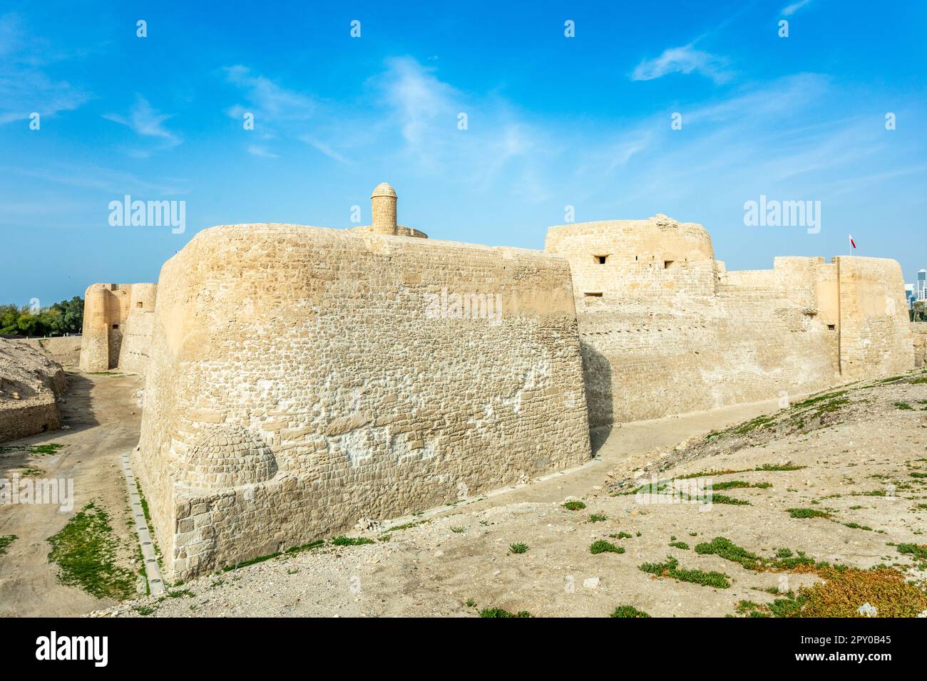 Walls and towers of Qalat al-Bahrain portuguese fortress, Manama ...