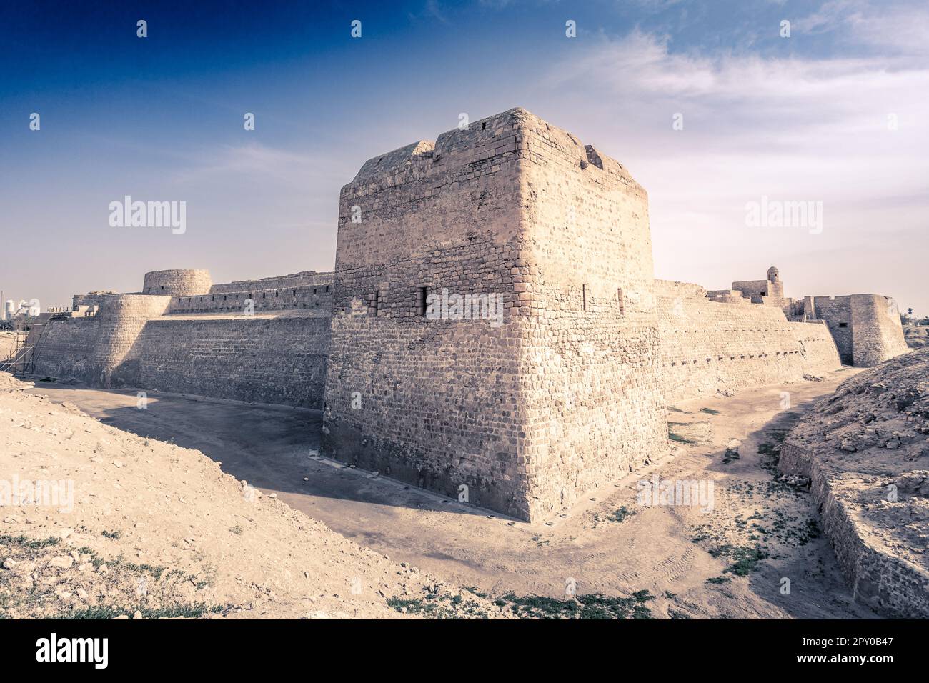 Walls and towers of Qalat al-Bahrain portuguese fortress, Manama ...