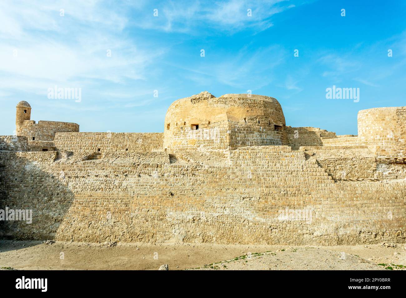 Walls and towers of Qalat al-Bahrain portuguese fortress, Manama ...