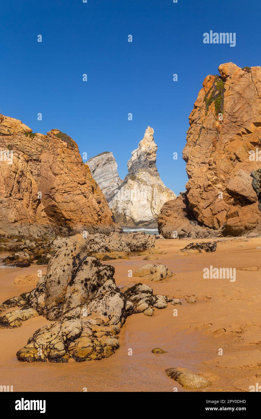 Towering rock cliffs at Praia Da Ursa Beach, Sintra, Portugal. Atlantic ...