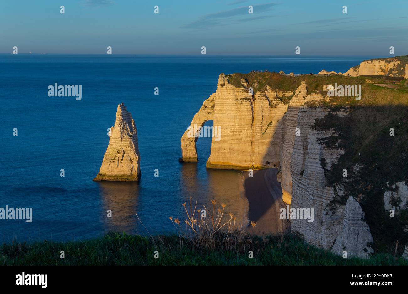 Sunset on the coast in Etretat, France. Etretat is a charming town ...