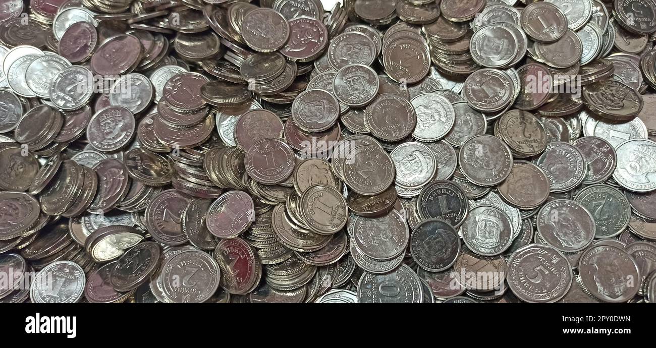 Pile of Ukrainian metal coins. Ukraine money. Obverse of contemporary ...