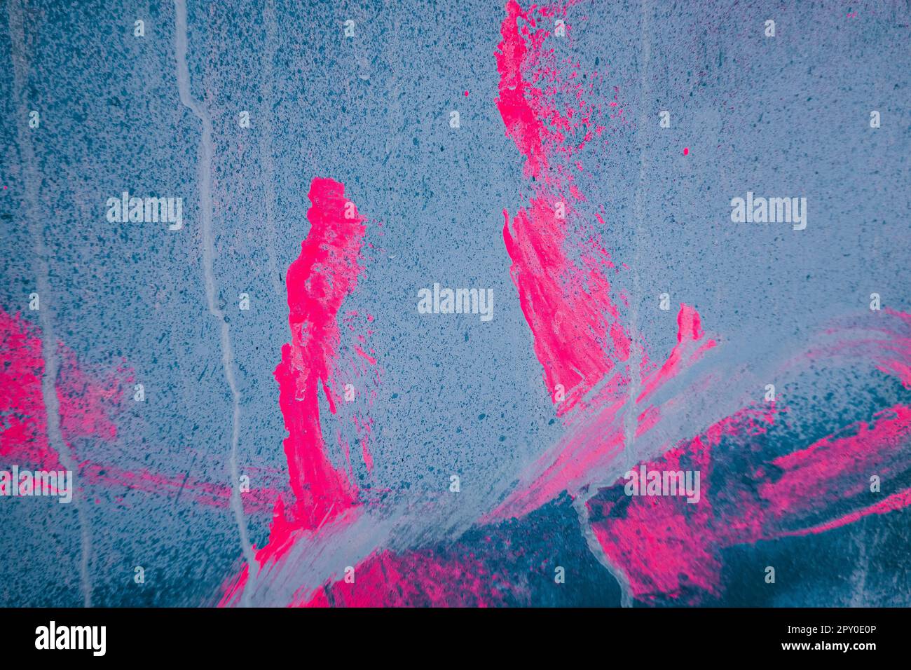 Messy paint strokes and smudges on an old painted wall background ...