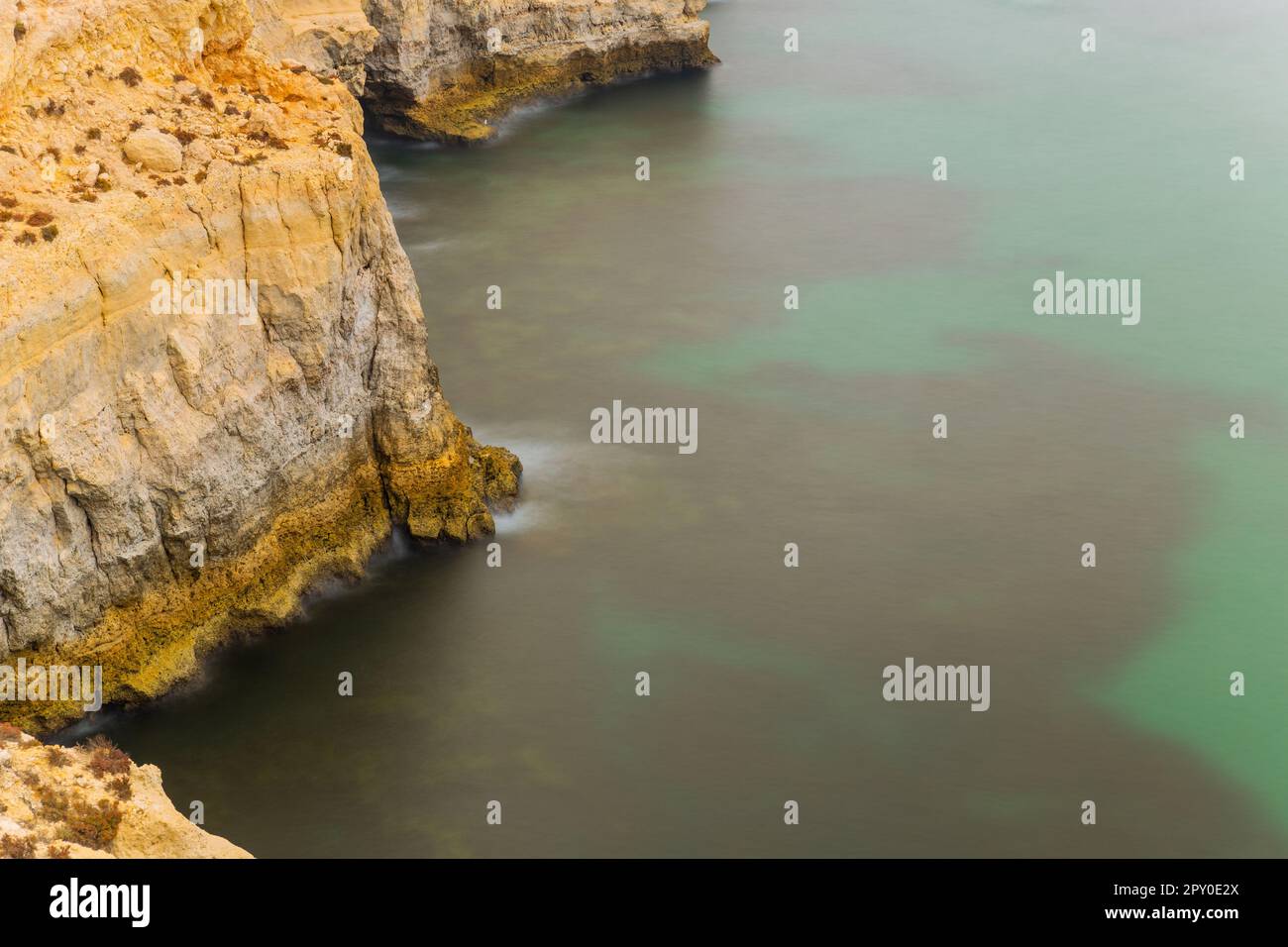 The famous coastline of Algarve in Portugal with Sandstone Cliffs ...