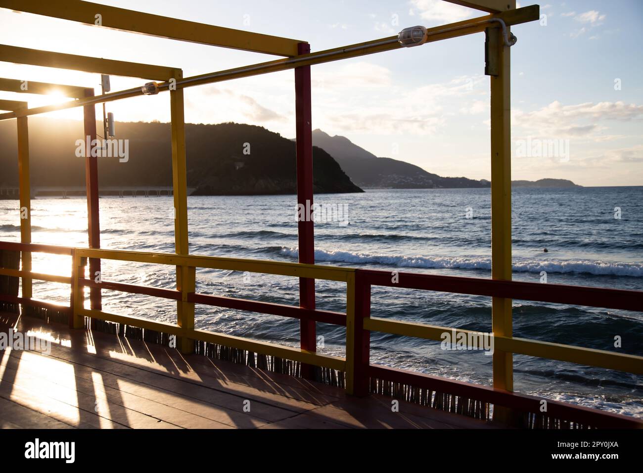 Cozy terrace on the beach, idyllic view of the seashore. Tropical ...