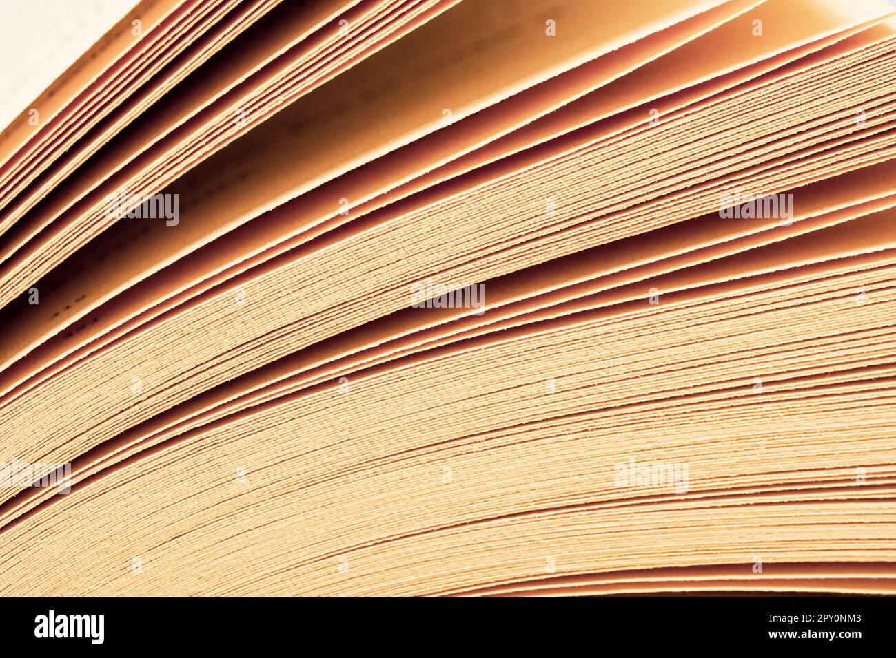 Closeup background of an old book with bending pages Stock Photo - Alamy