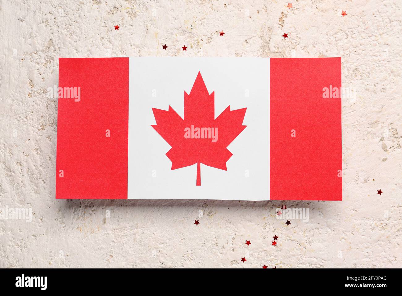 Paper flag of Canada on grunge background Stock Photo - Alamy