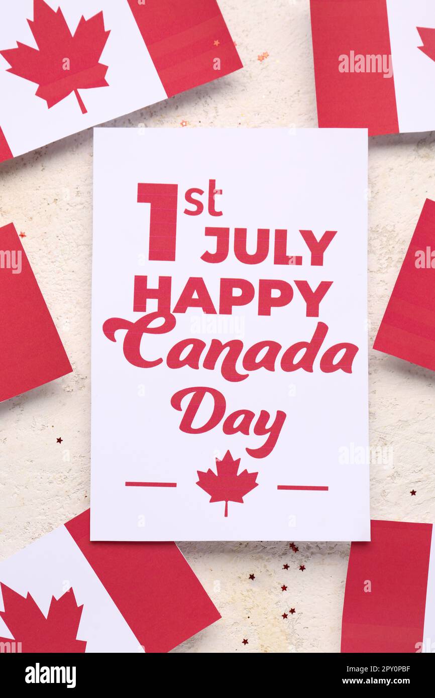 Card with text 1ST JULY HAPPY CANADA DAY and flags on grunge background ...