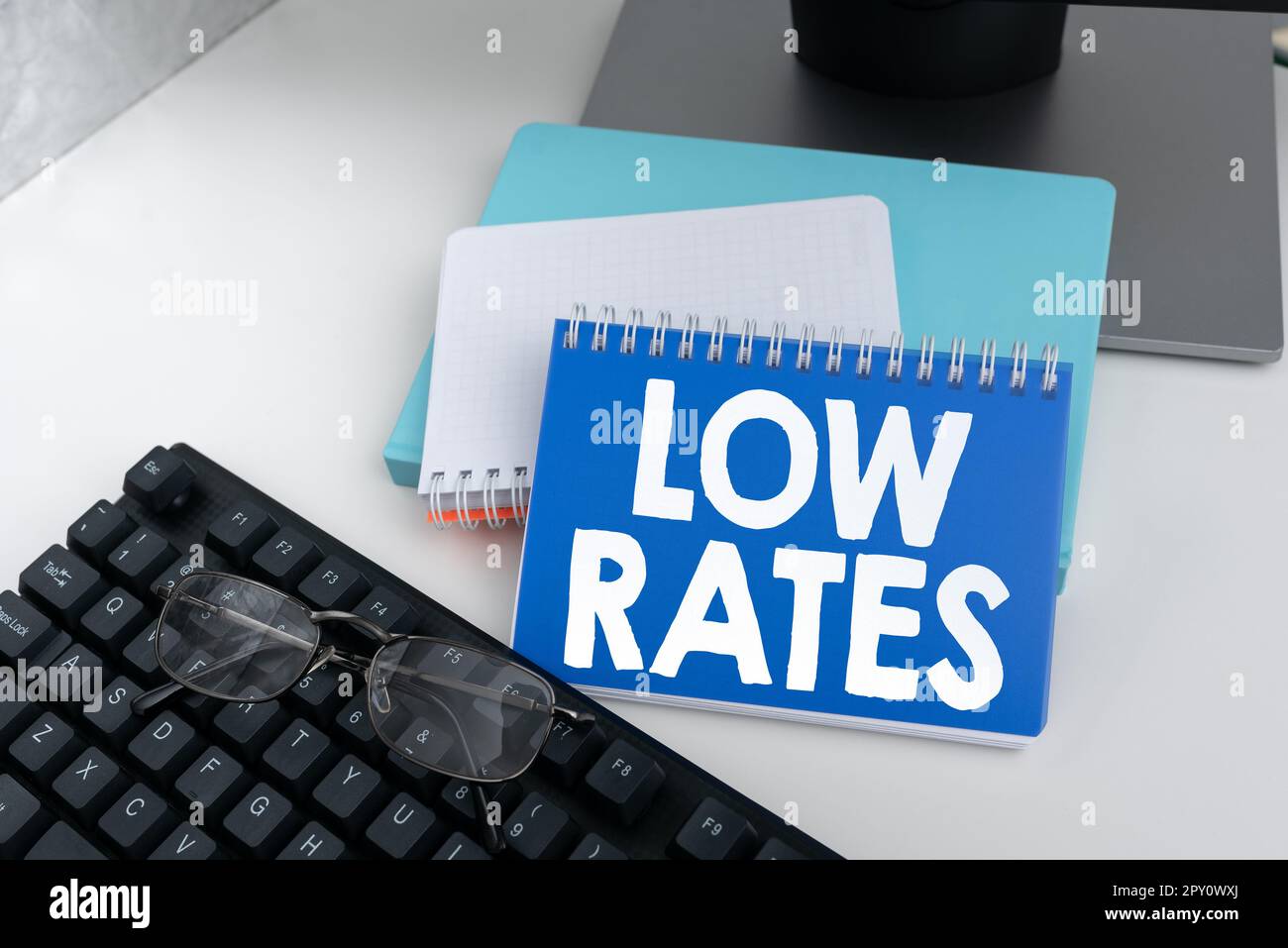 Handwriting text Low Rates, Business showcase A cost of an item or ...