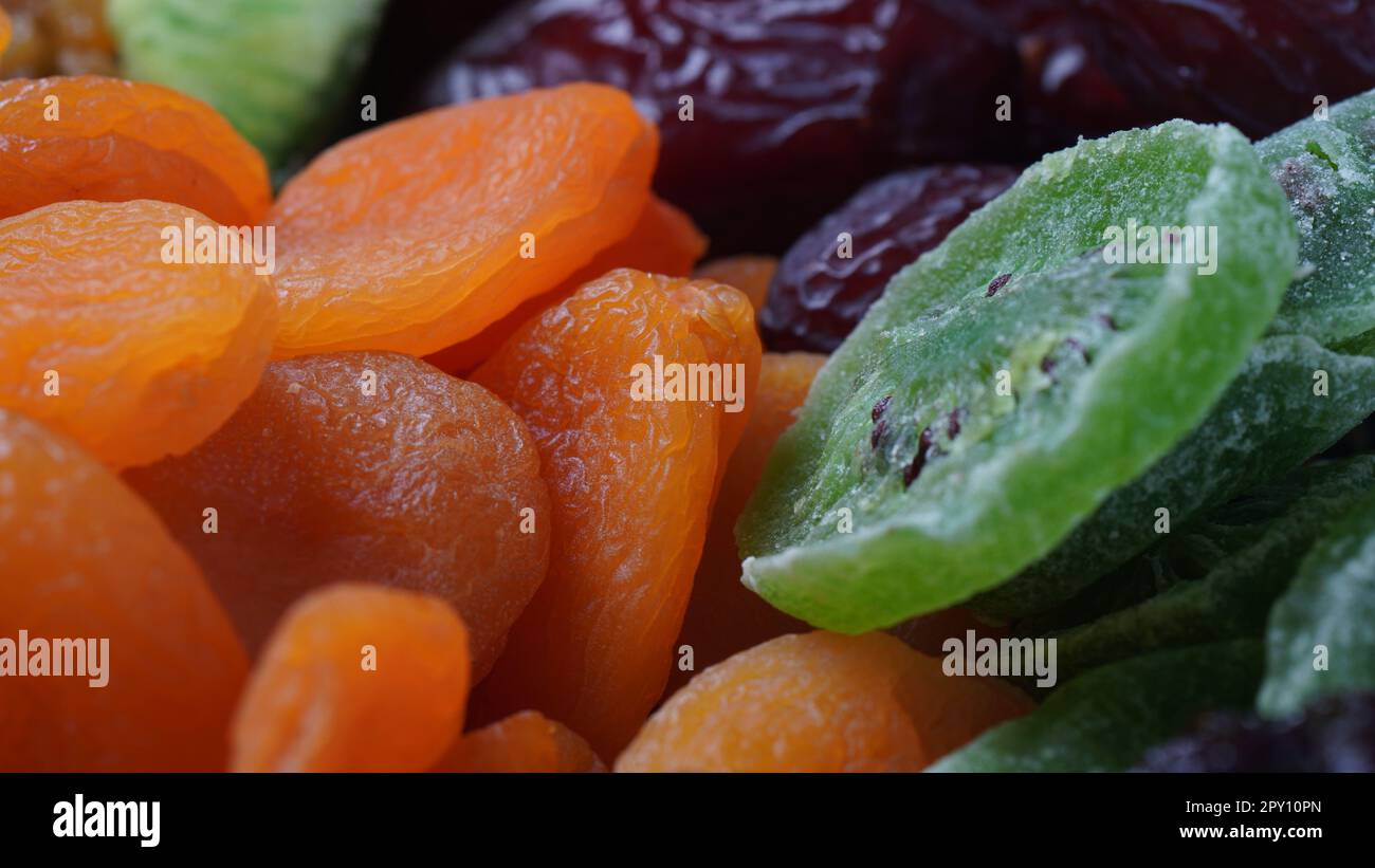 Dried apricots and assorted dry fruits: Dry plum, kiwi, raisins, nuts ...