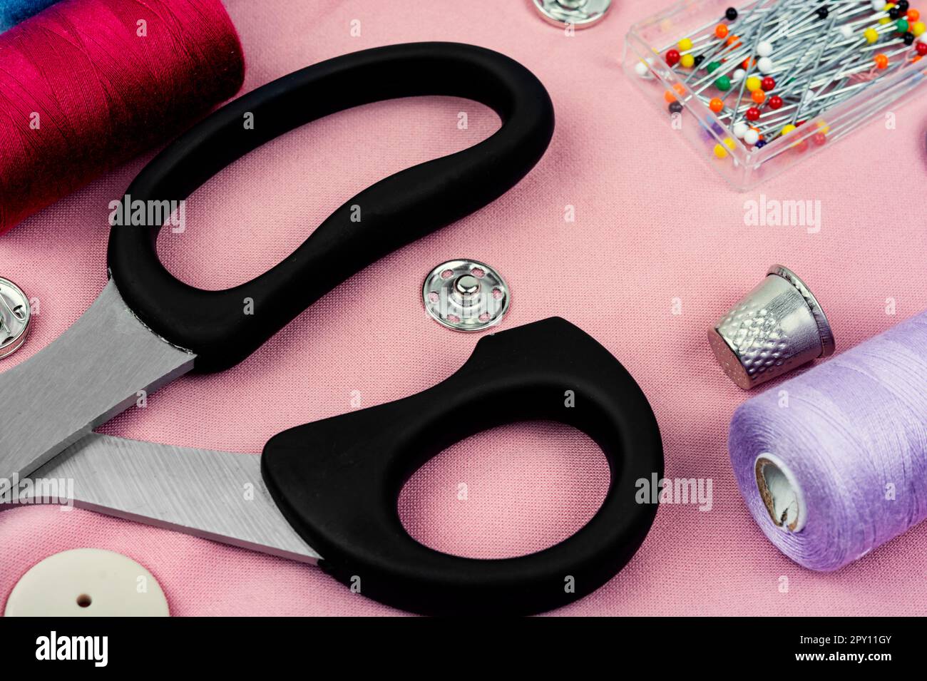 Sewing kit, scissors, needles and colorful thread. Sewing items Stock ...