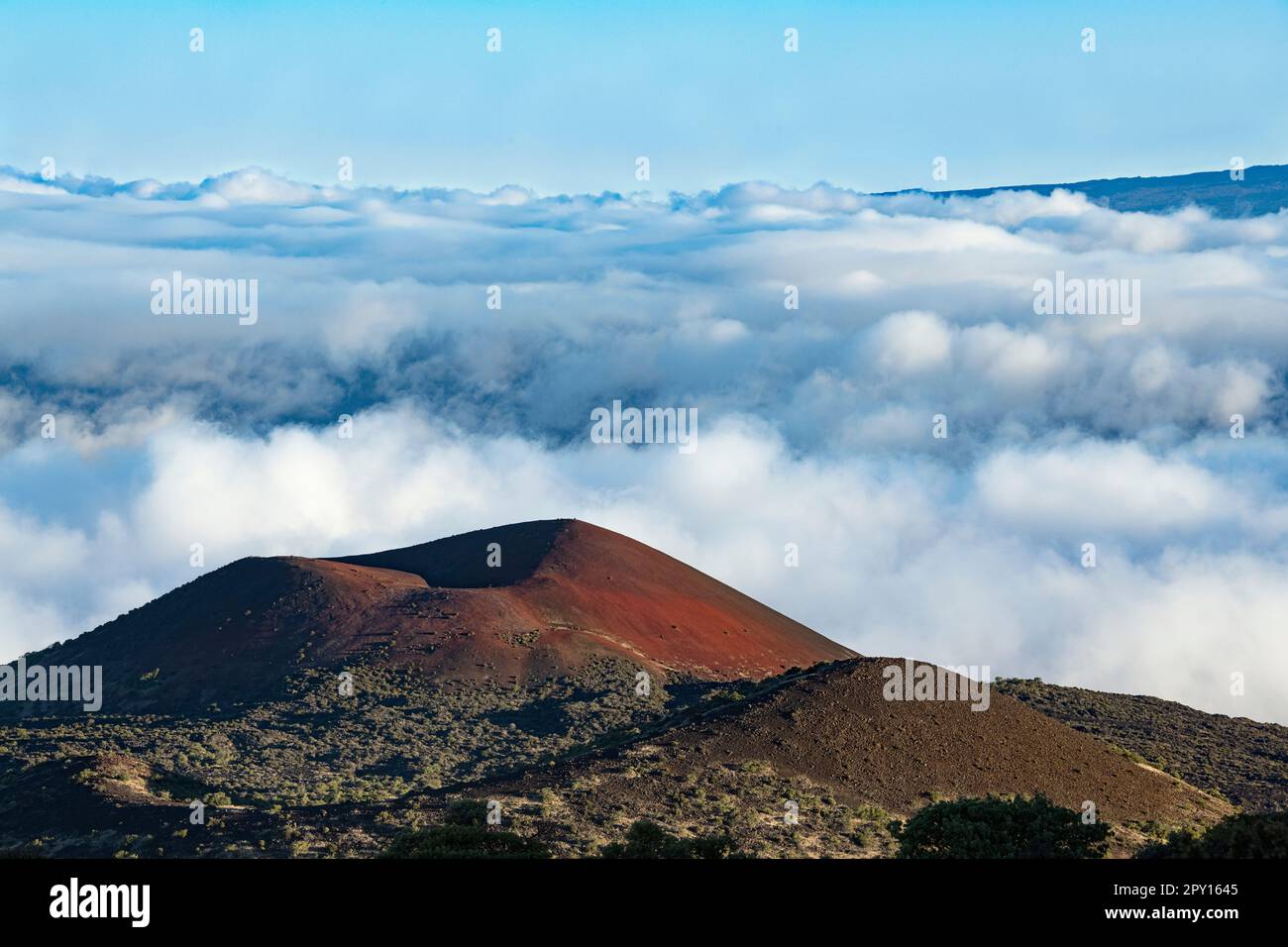 Pu'u Kole cinder cone on the slopes of MaunaKea volcano with Mauna Loa ...