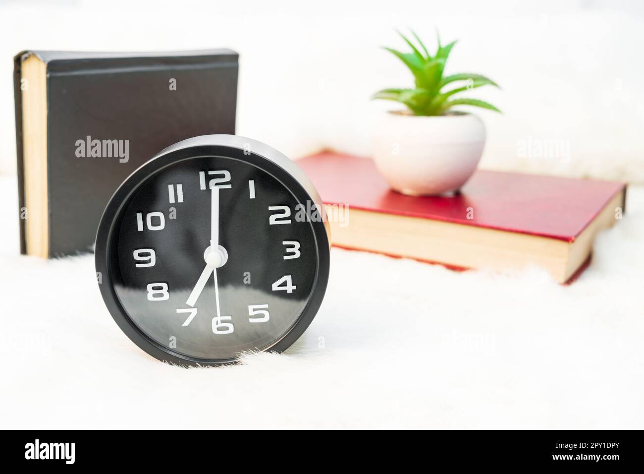 Black alarm clock stacked hi-res stock photography and images - Alamy