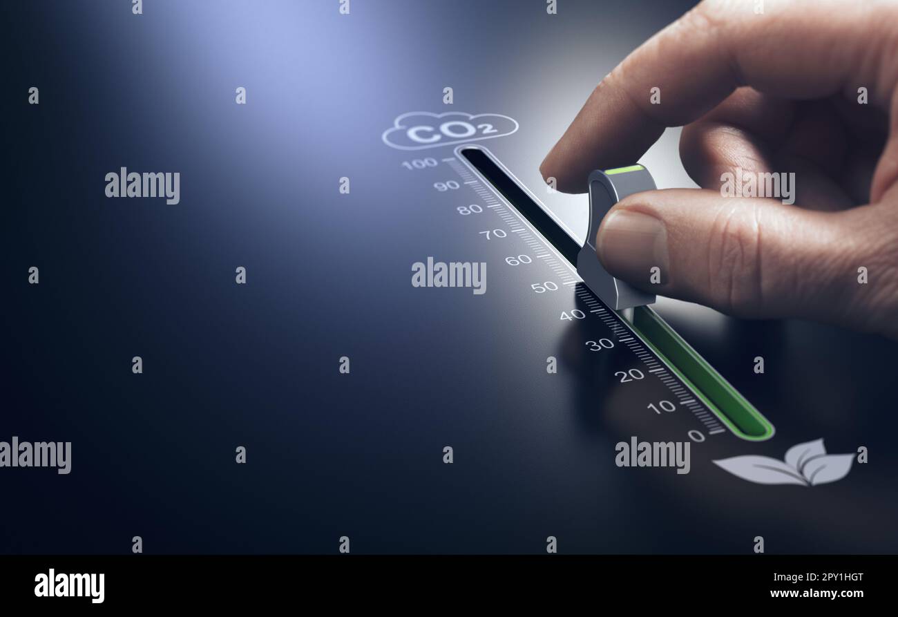 Hand using a slider to reduce CO2 emissions. Carbon free energy ...