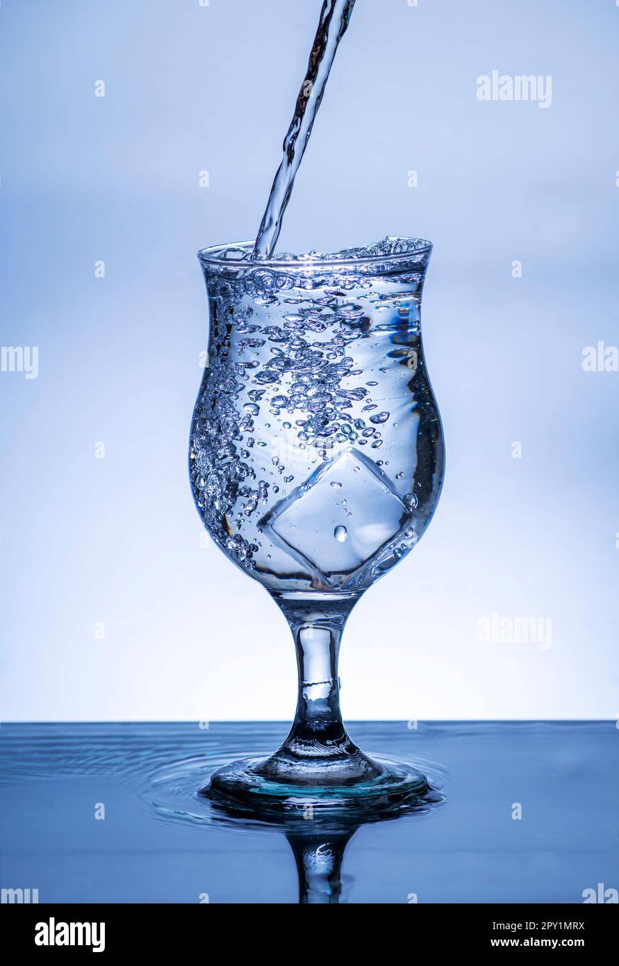 The image of pouring drinking water, into a glass, that makes one feel ...