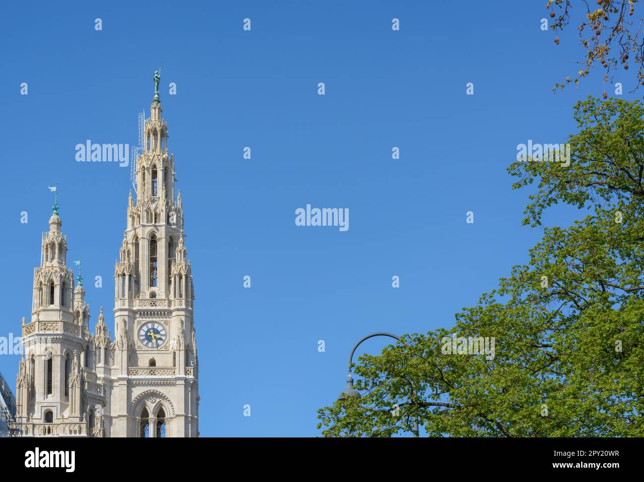 Towers of the City Hall in Vienna against the blue sky in a horizontal ...