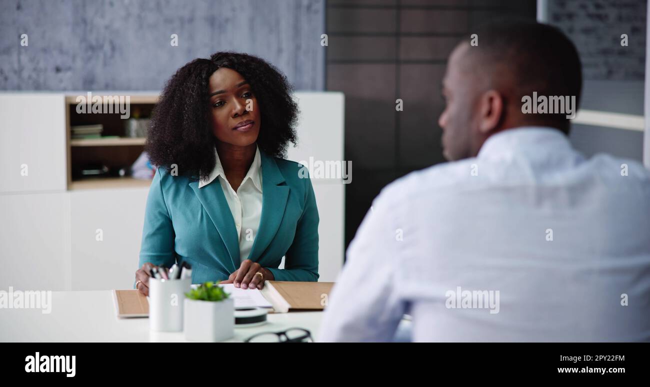 Interview Conversation. Talking In Job Hiring Meeting Stock Photo - Alamy
