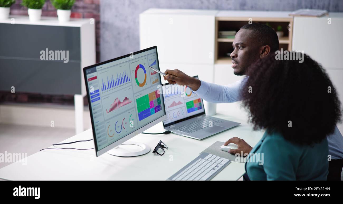 African American Data Analyst Using Data Analytics KPI Dashboard Stock ...