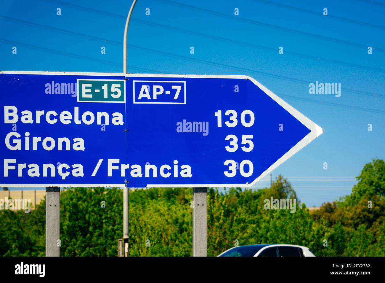 Barcelona road signs showing distances to Girona and France Stock Photo ...