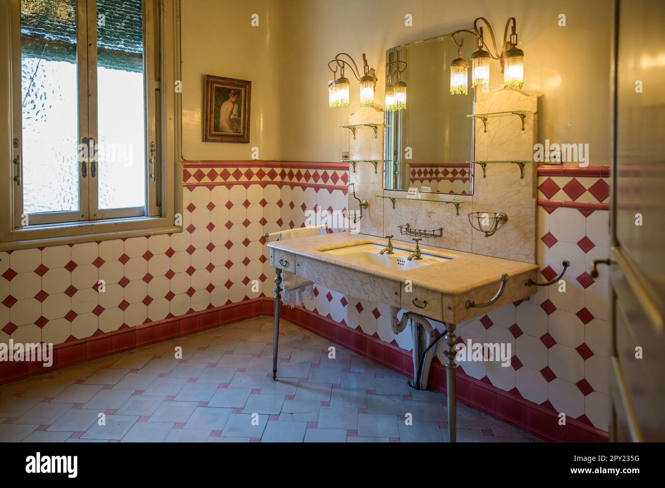 Bathroom under daylight with warm light from interior lights at home ...