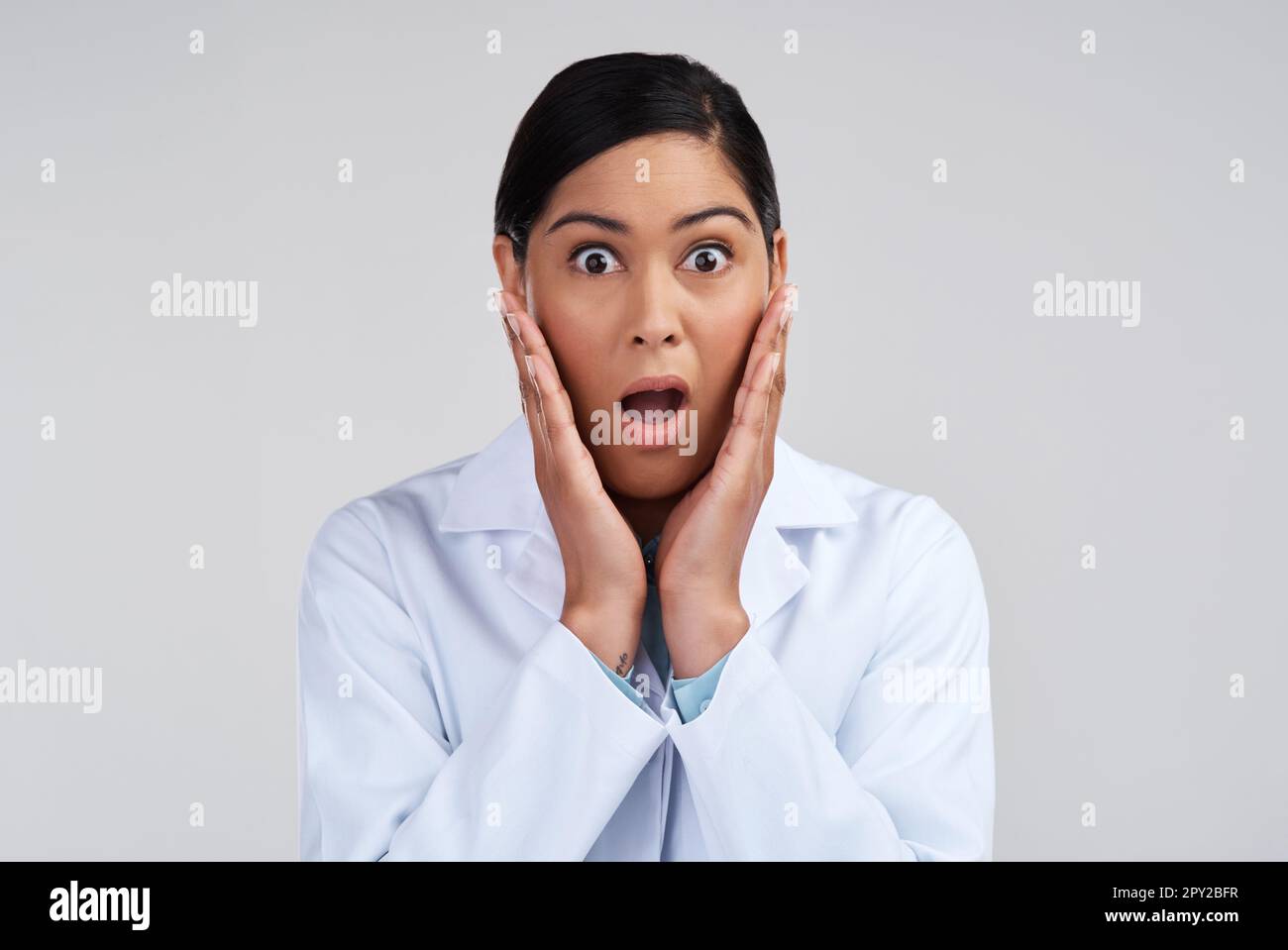 This cant be good. Cropped portrait of an attractive young female ...