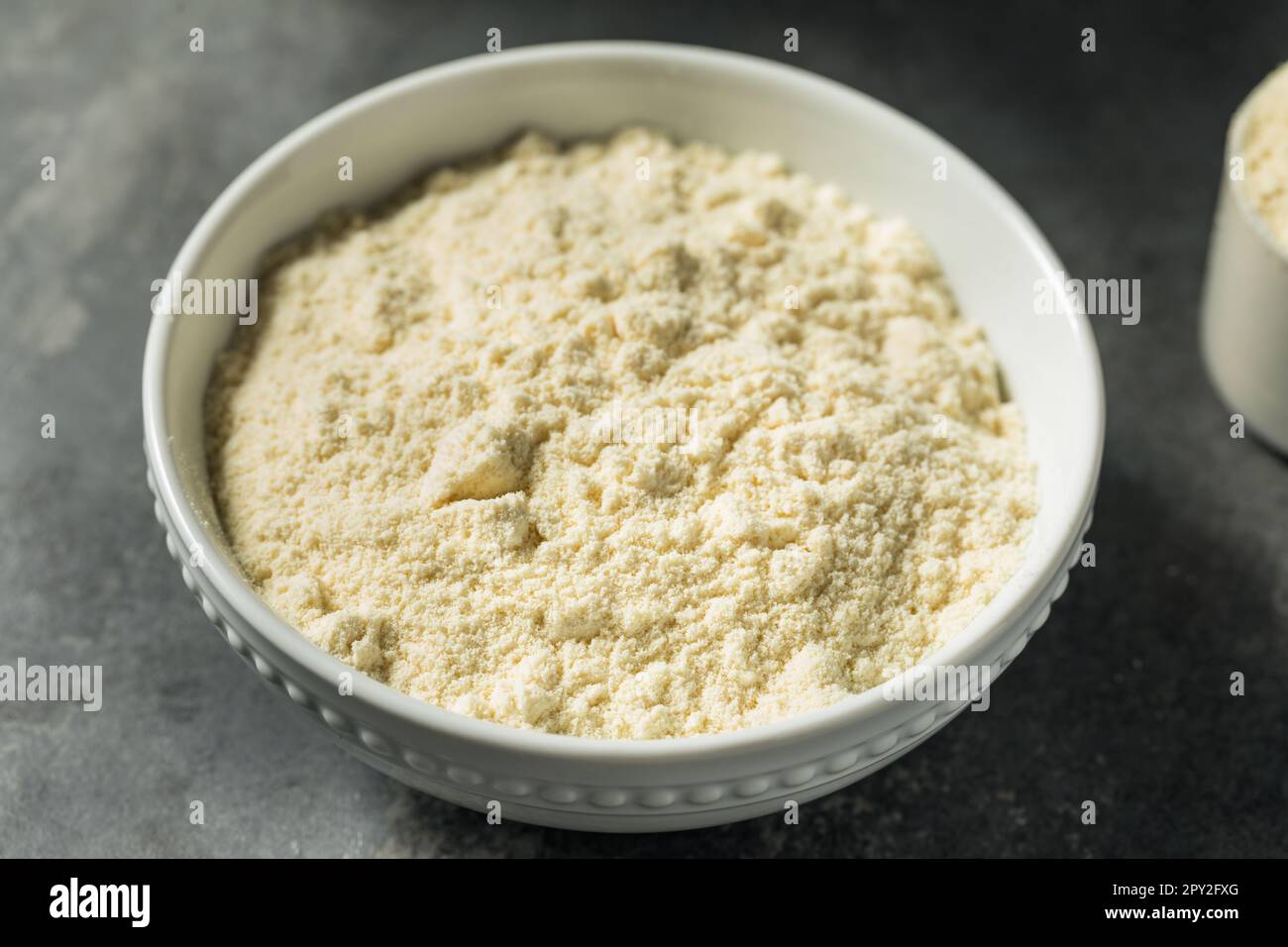 Organic Healthy Vanilla Whey Protein Powder in a Scoop Stock Photo - Alamy